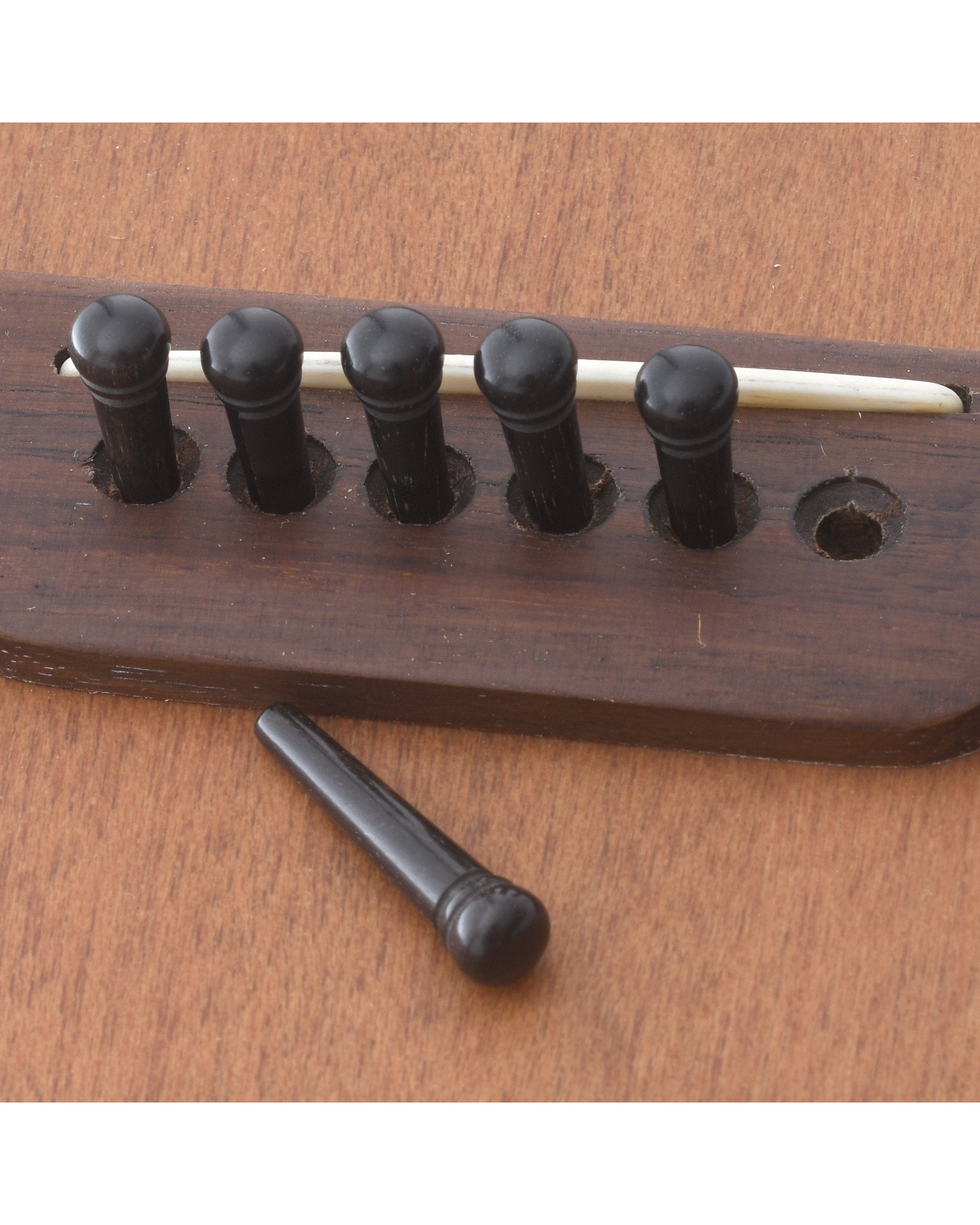 Ebony Oversize Bridge Pins, Slotted, Set of 6 – Elderly Instruments